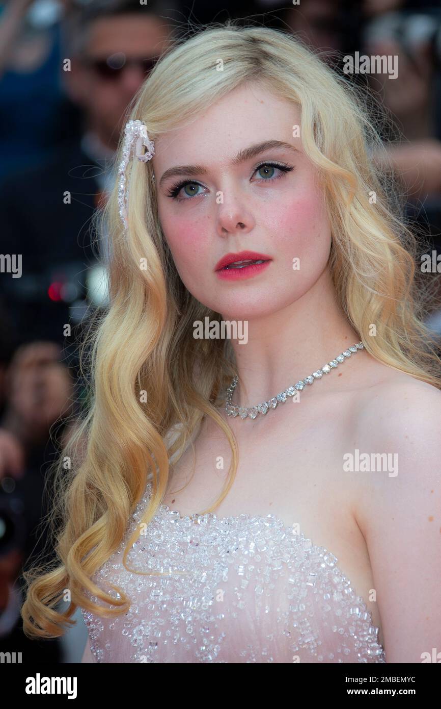 Elle Fanning poses for photographers upon arrival at the premiere of ...