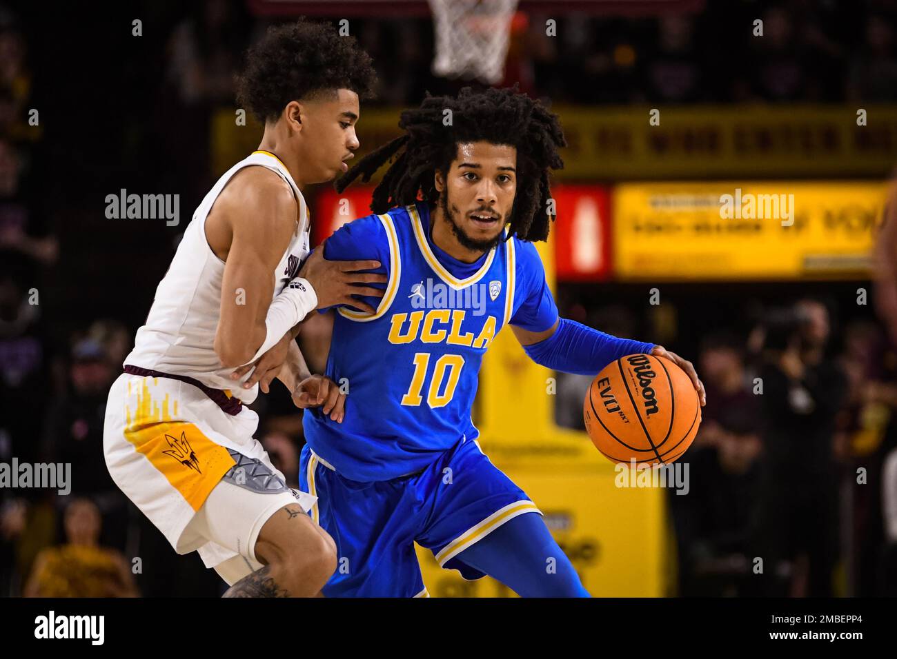UCLA guard Tyger Campbell (10) drives down court in the first half of ...