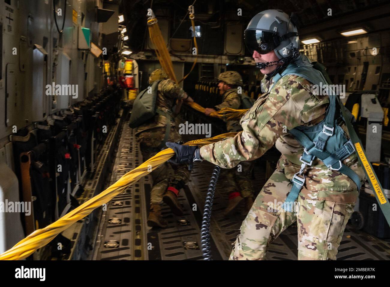 U.S. Air Force Master Sgt. Norman Metz, loadmaster, and U.S. Army ...
