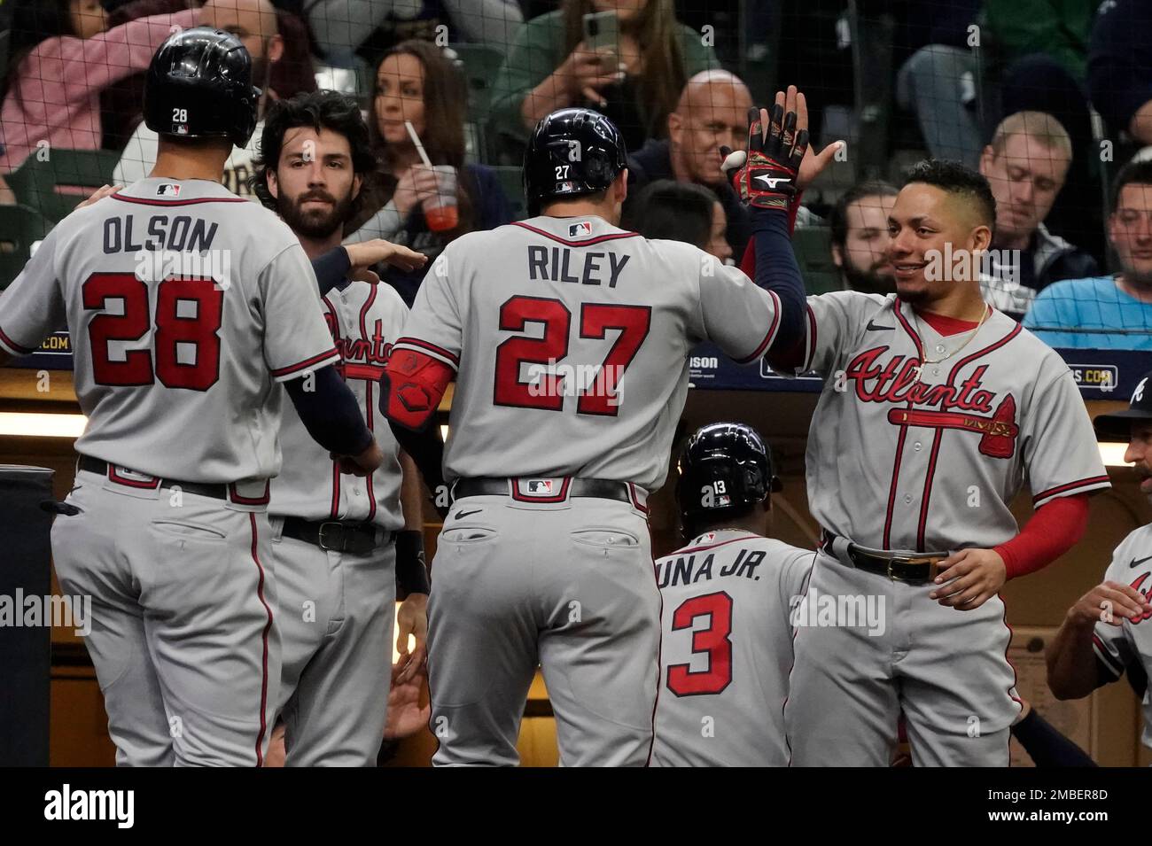 Atlanta Braves' Austin Riley is congratulated after hitting a three-run ...