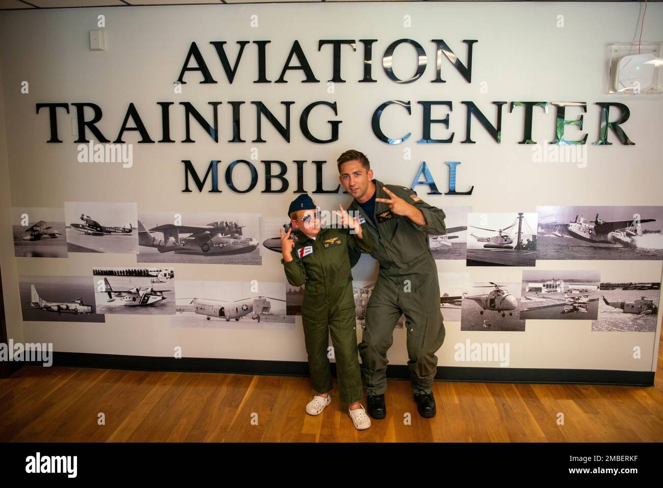 Coast Guard Lt. j.g. Nick Wittrock, pilot, and Ethan, honorary aviator ...