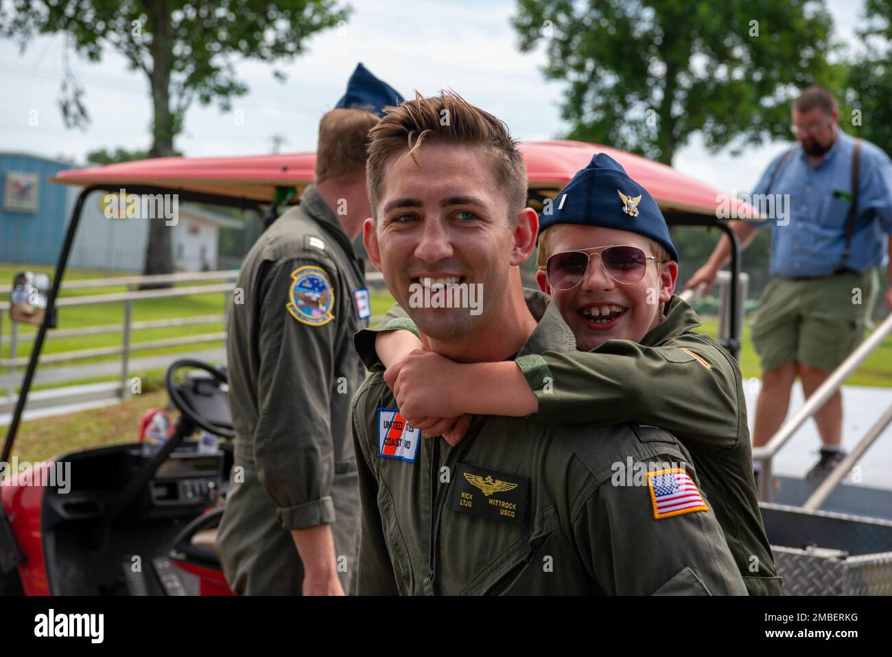 Coast Guard Lt. j.g. Nick Wittrock, pilot, gives Ethan, honorary ...