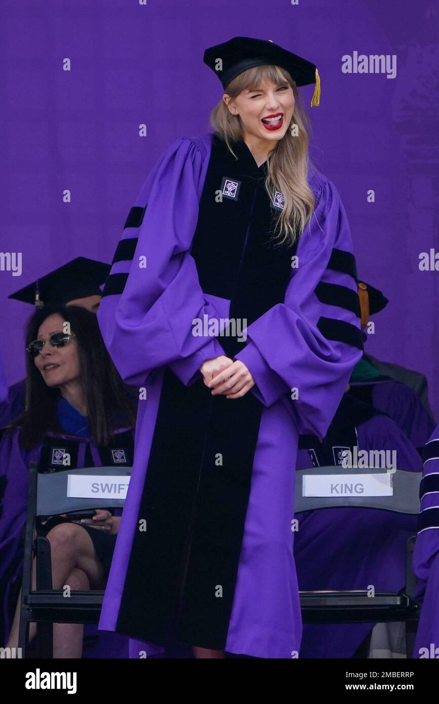 Taylor Swift reacts to the crowd during a graduation ceremony for New ...