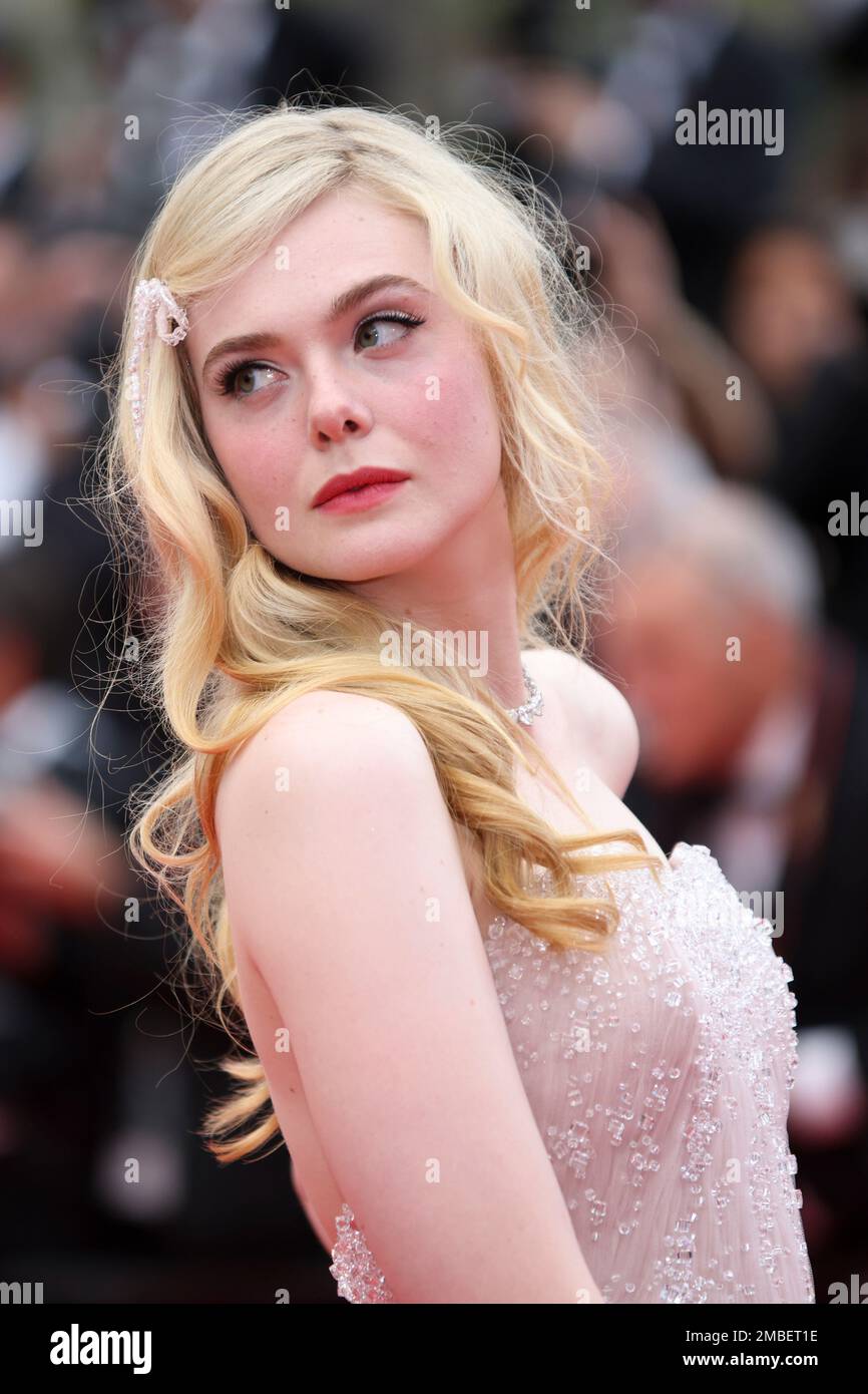 Elle Fanning poses for photographers upon arrival at the premiere of ...