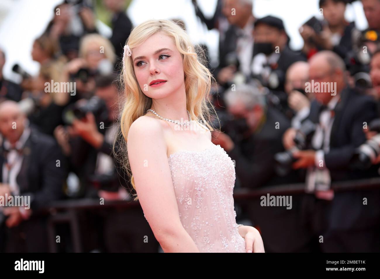 Elle Fanning poses for photographers upon arrival at the premiere of ...