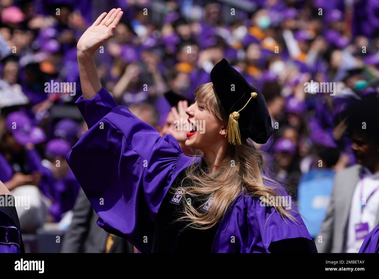 Taylor Swift waves to graduates as she participates in a graduation ...