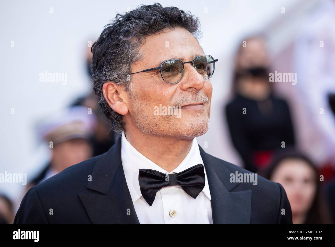 Pascal Elbe poses for photographers upon arrival at the opening ...
