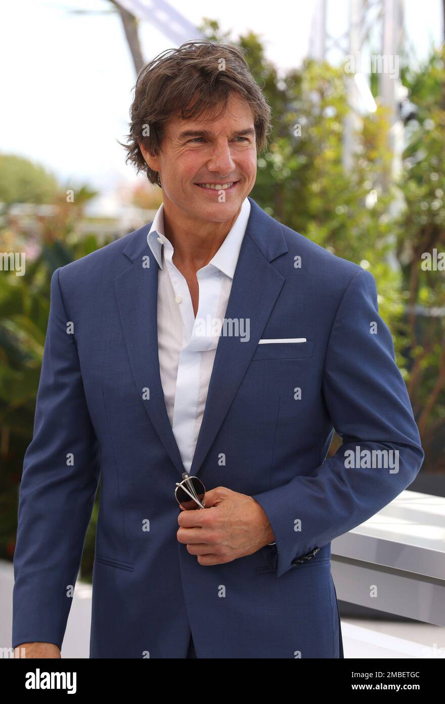 Tom Cruise poses for photographers at the photo call for the film 'Top ...