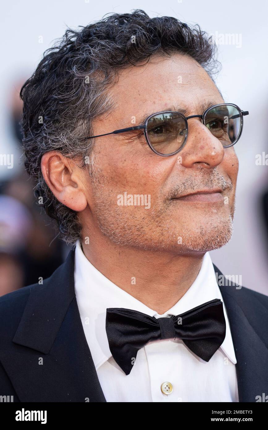 Pascal Elbe poses for photographers upon arrival at the opening ...