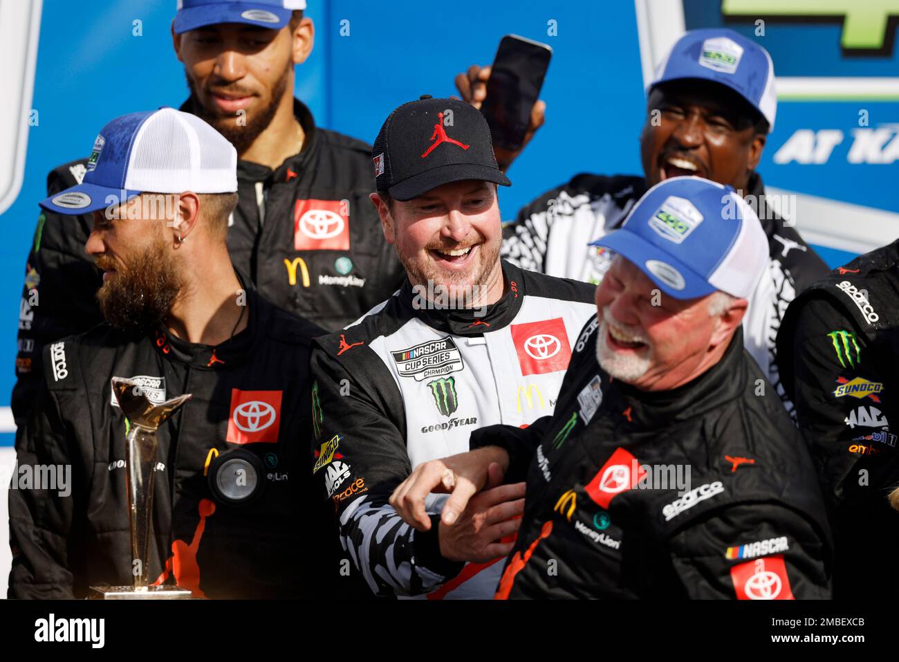 Kurt Busch, center celebrates with his 23XI Racing crew in Victory Lane ...