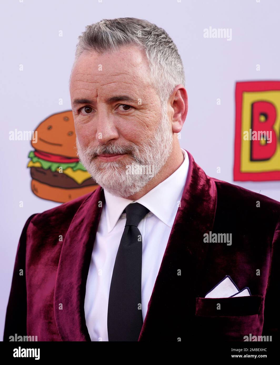 Larry Murphy poses at the premiere of the film "The Bob's Burgers Movie ...