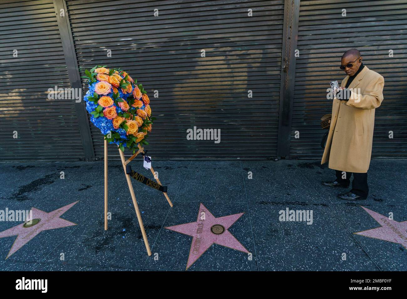 Television producer Kevin Bandy takes a picture of the star of the ...