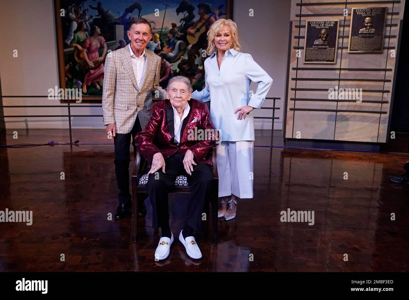 Music executive Joe Galante, left; singer Jerry Lee Lewis, center; and ...