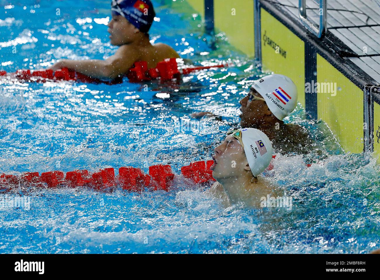 Hoe Yean Khiew, front, of Malaysia reacts after the Men's 200m ...