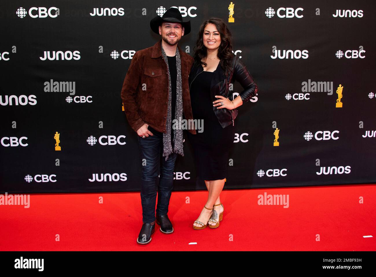 Brett Kissel, left, and his wife Cecilia Kissel arrive at the JUNO ...