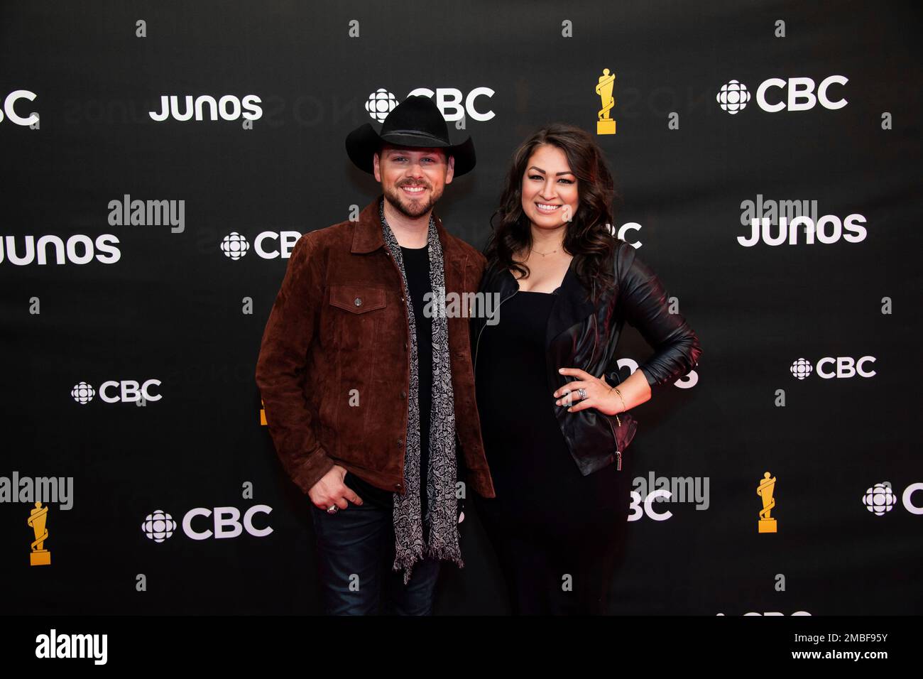 Brett Kissel, left, and his wife Cecilia Kissel arrive at the JUNO ...