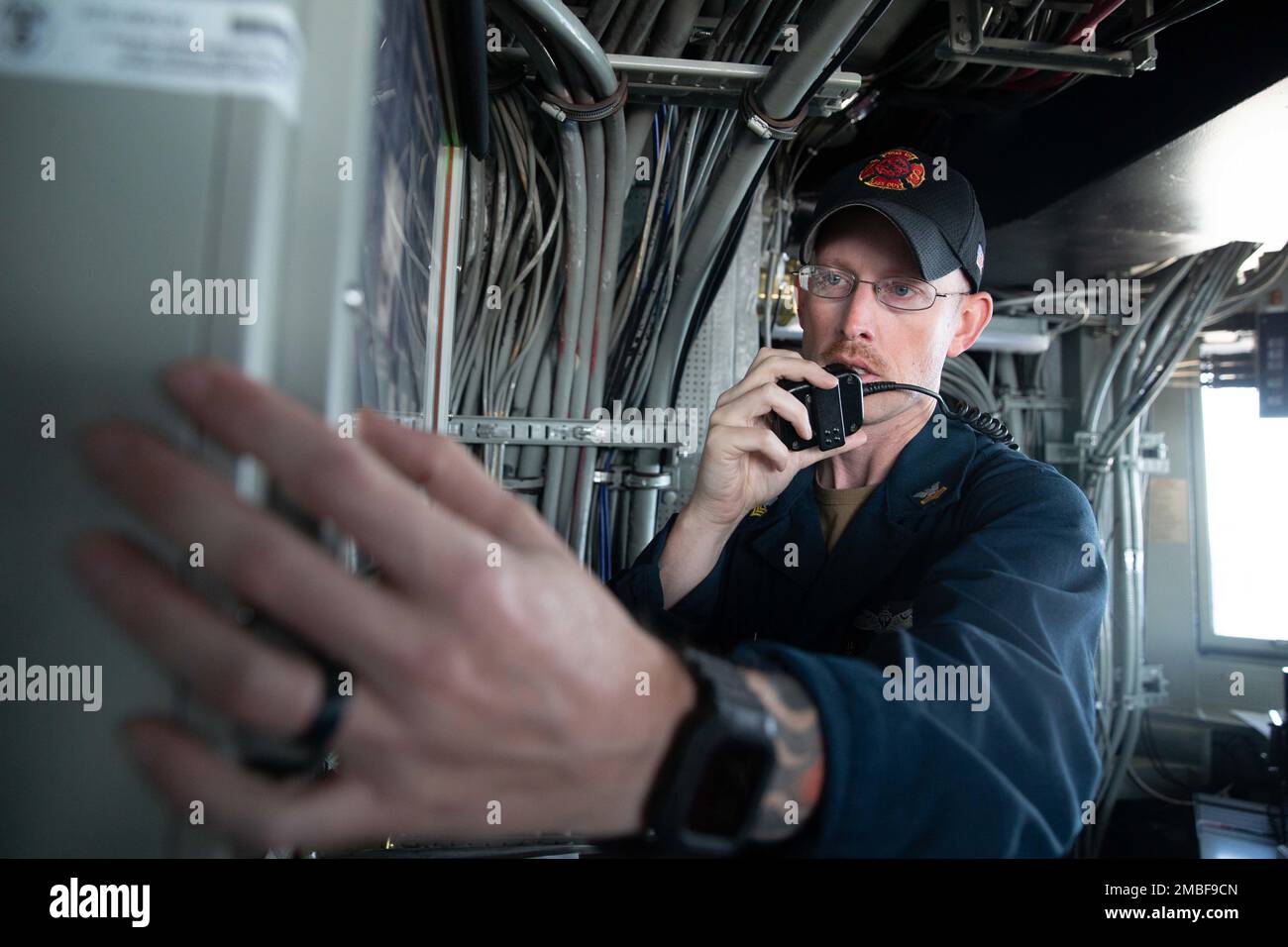 Damage Controlman 1st Class Jon Gerringer, from Charlotte, North ...