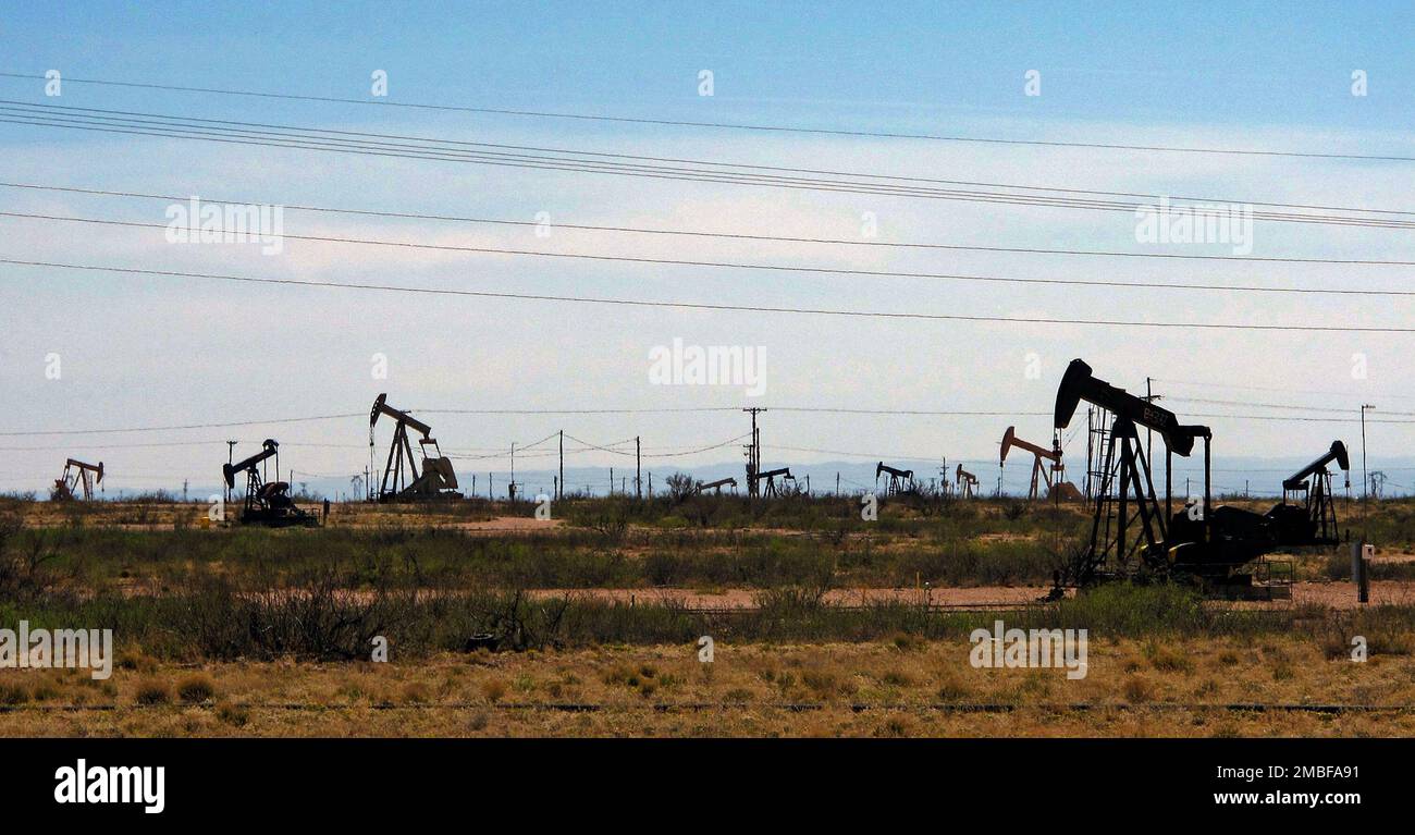 FILE - Oil rigs stand in the Loco Hills field along U.S. Highway 82 in ...