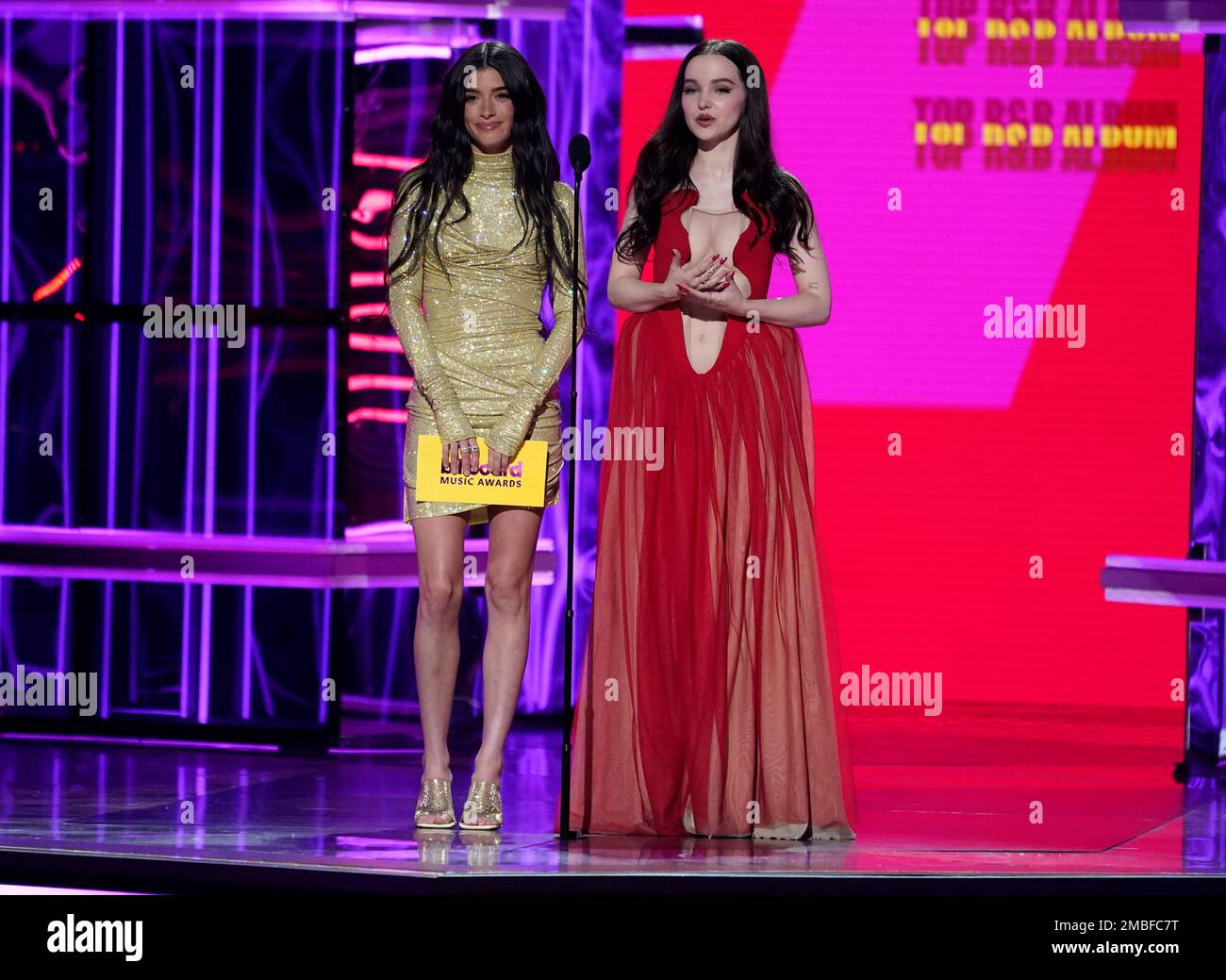 Dixie D'Amelio, left, and Dove Cameron presents the award for top R&B ...