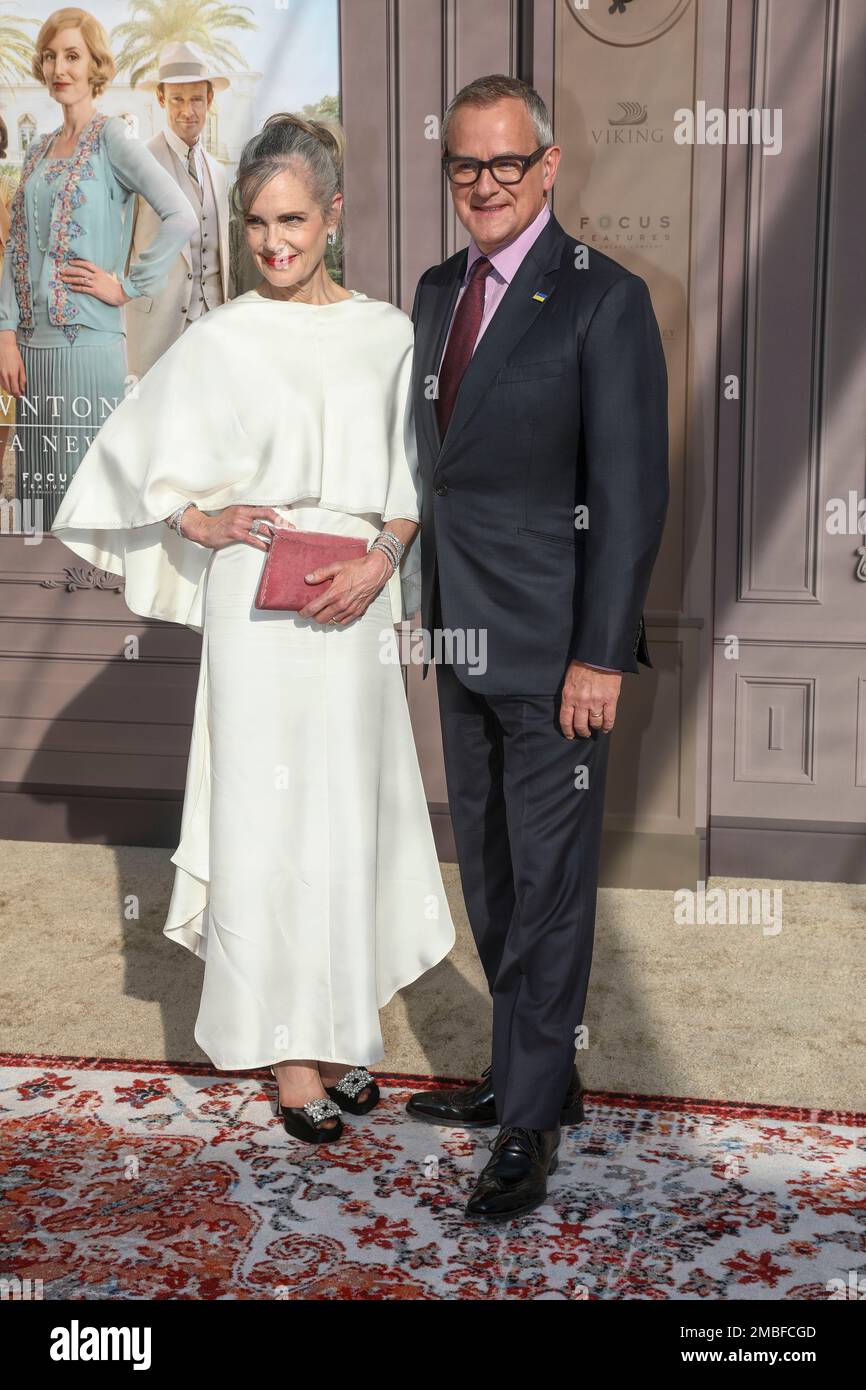 Actors Elizabeth McGovern, left, and Hugh Bonneville, right, attend the ...