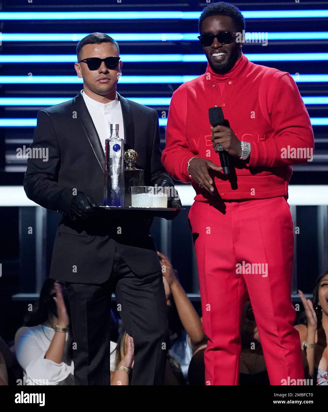 Frank-butler, left, and Sean "Diddy" Combs introduce a performance by ...