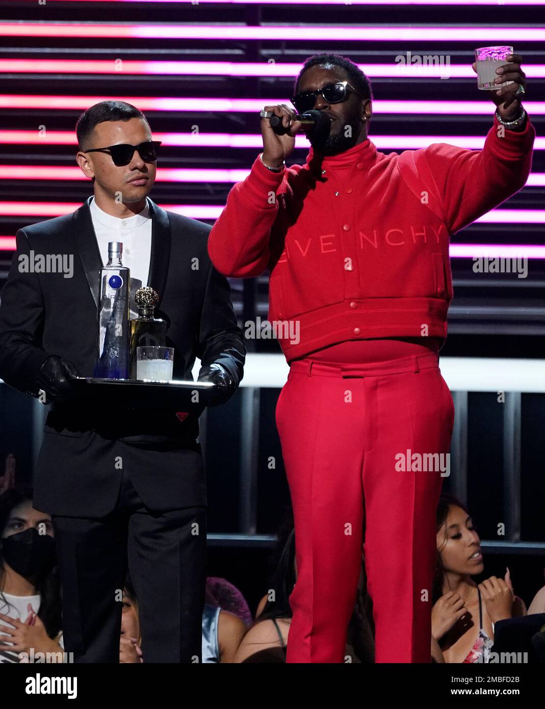 Frank-butler, left, and Sean "Diddy" Combs introduce a performance by ...
