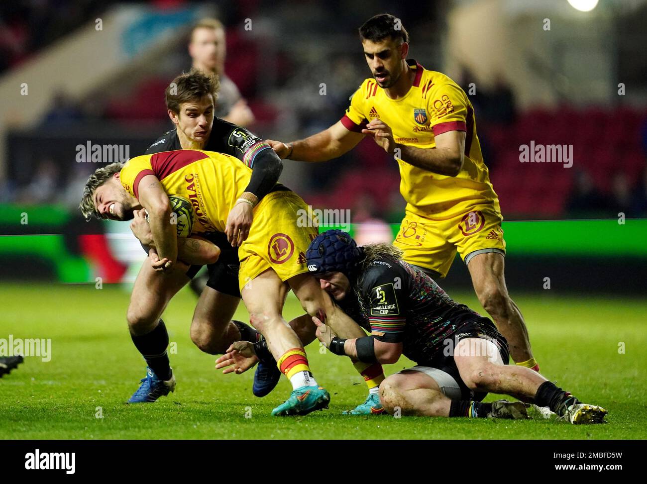 USA Perpignan’s Nino Seguela is tackled by Bristol Bears’ Harry Thacker ...