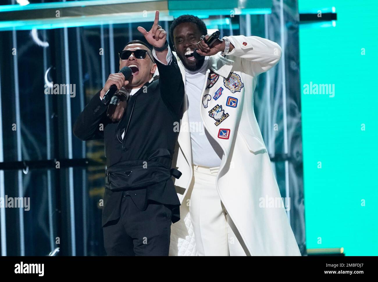 Frank-butler, left, and Sean "Diddy" Comb introduce a performance by ...