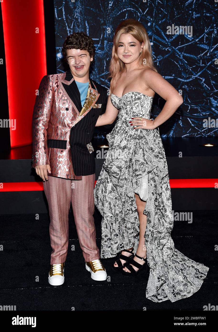 Gaten Matarazzo, left, and girlfriend Elizabeth Yu attend the premiere ...