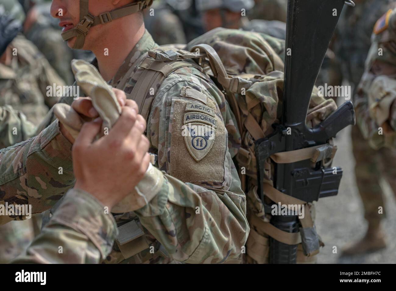 Instructors from 25th Infantry Division’s Lightning Academy inspect the ...