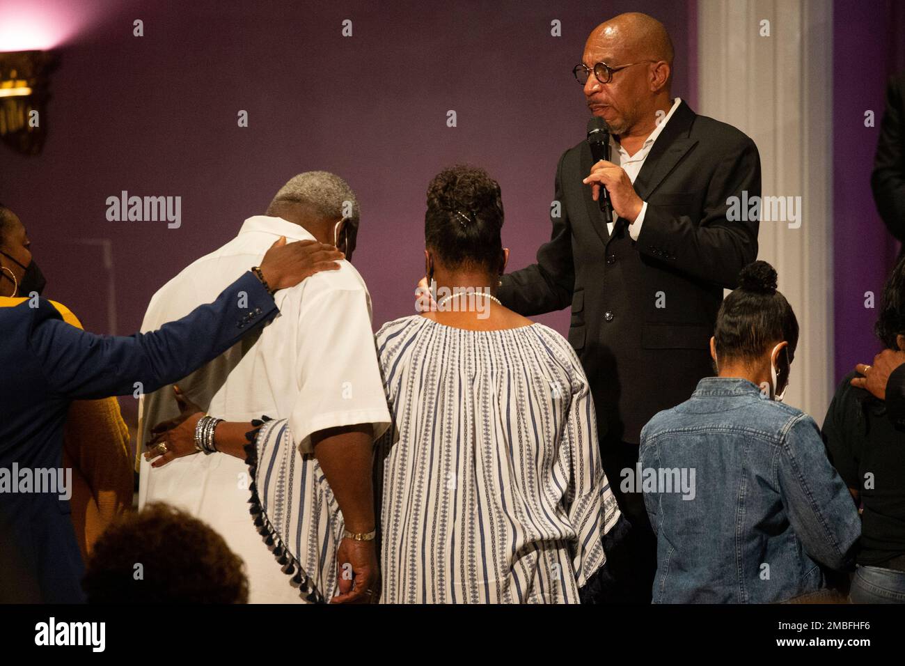 Bishop Darius Pridgen leads a prayer for those impacted by the shooting ...