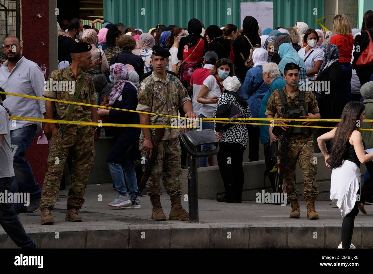 People line up to vote during parliamentary elections in Beirut ...
