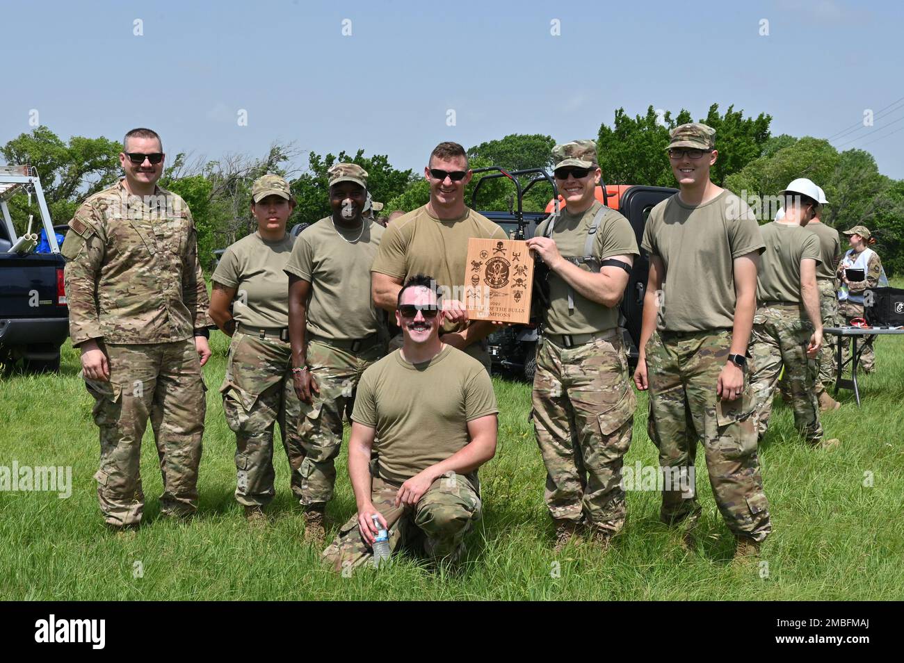 Airmen from the 22nd Civil Engineer Squadron pose with their trophy ...