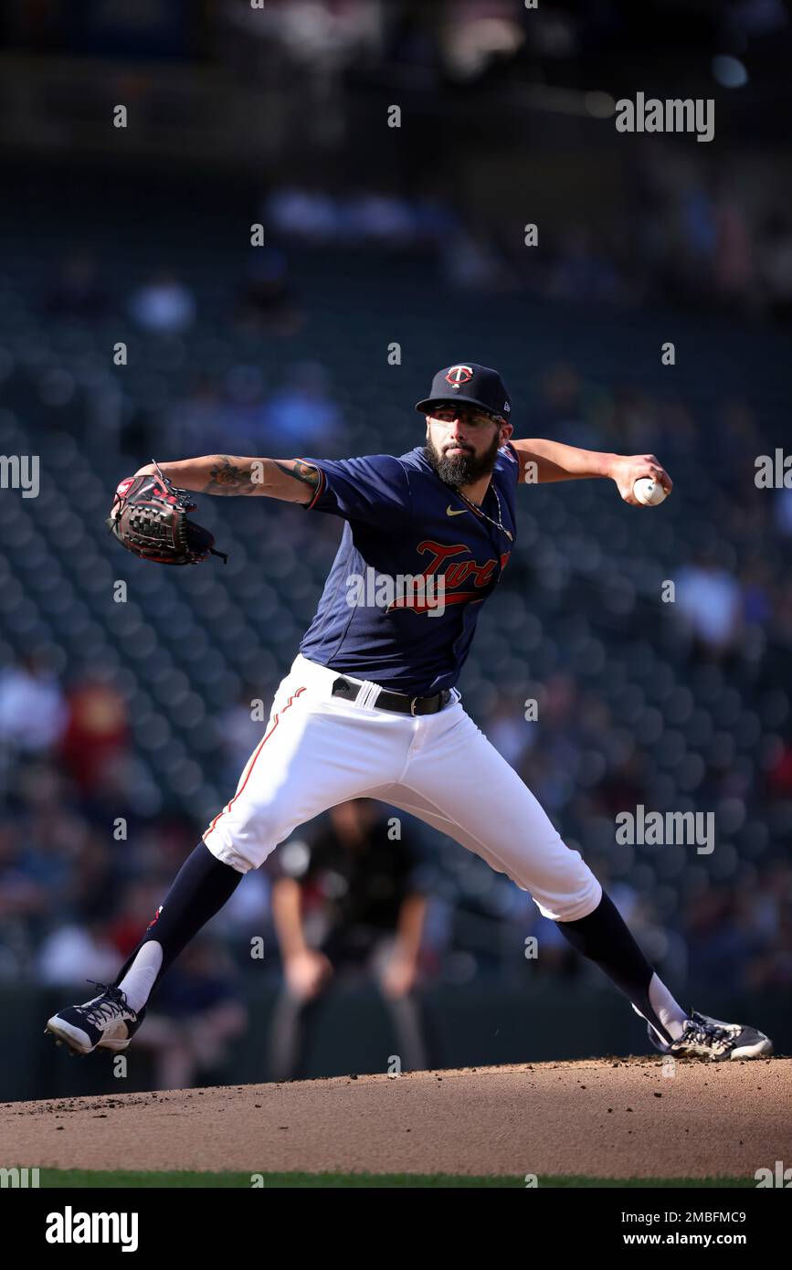 Minnesota Twins pitcher Devin Smeltzer throws to a Cleveland Guardians ...