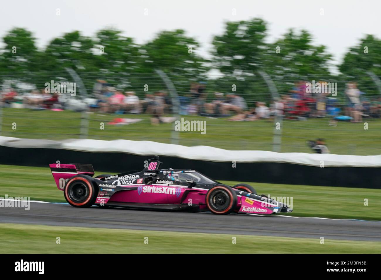 Helio Castroneves, of Brazil, drives during the IndyCar Grand Prix auto ...
