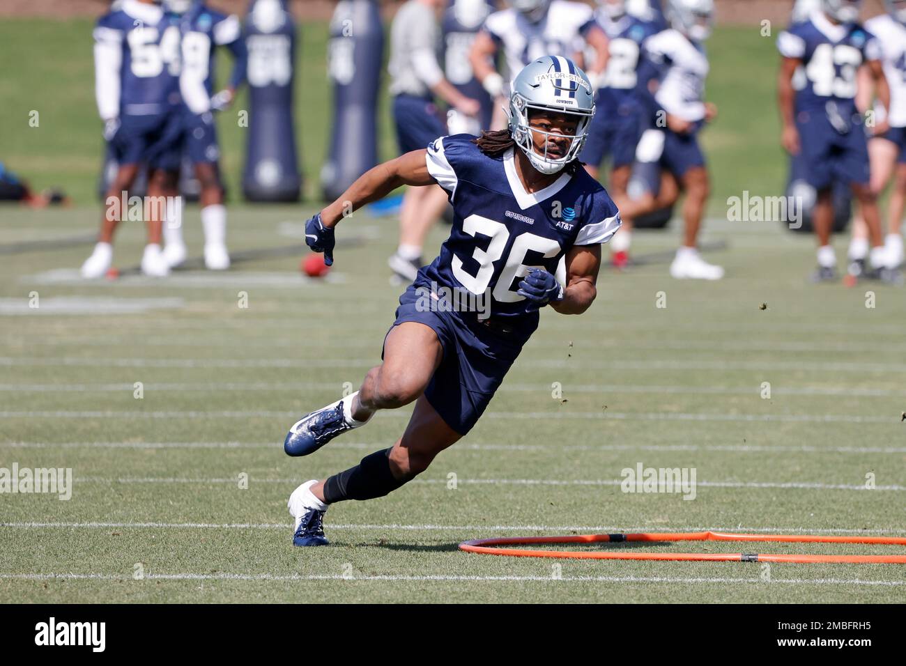 Dallas Cowboys cornerback Isaac Taylor-Stuart runs with the ball during ...