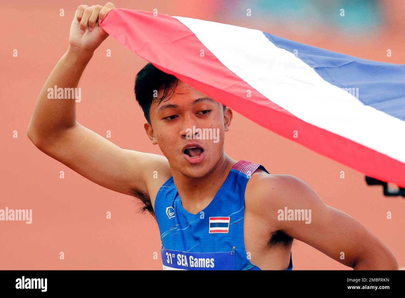 Gold medalist Puripol Boonson of Thailand celebrates with the national ...