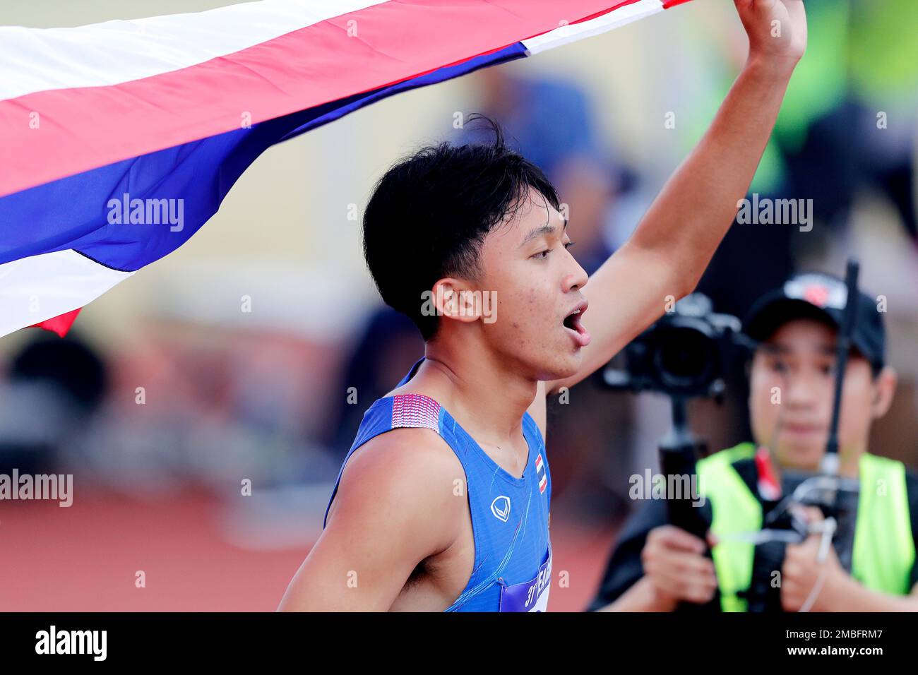Gold medalist Puripol Boonson of Thailand celebrates with the national ...