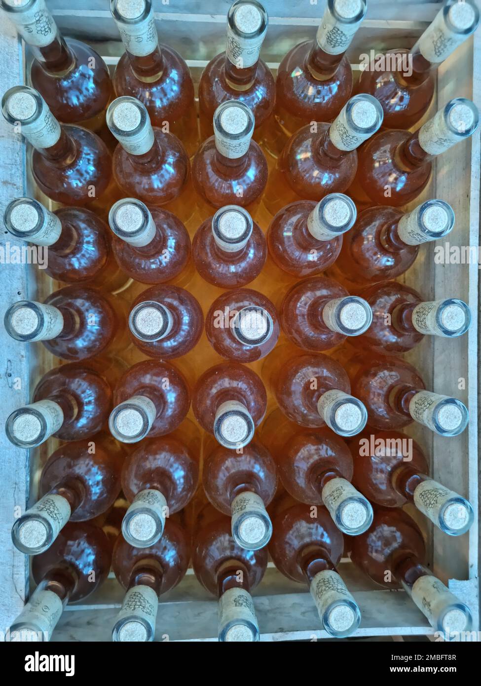 a high angle shot of beer bottles in a box Stock Photo - Alamy