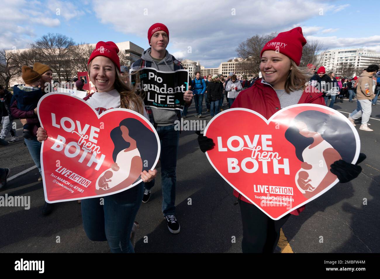 Anti-abortion demonstrators march toward the U.S. Supreme Court during ...