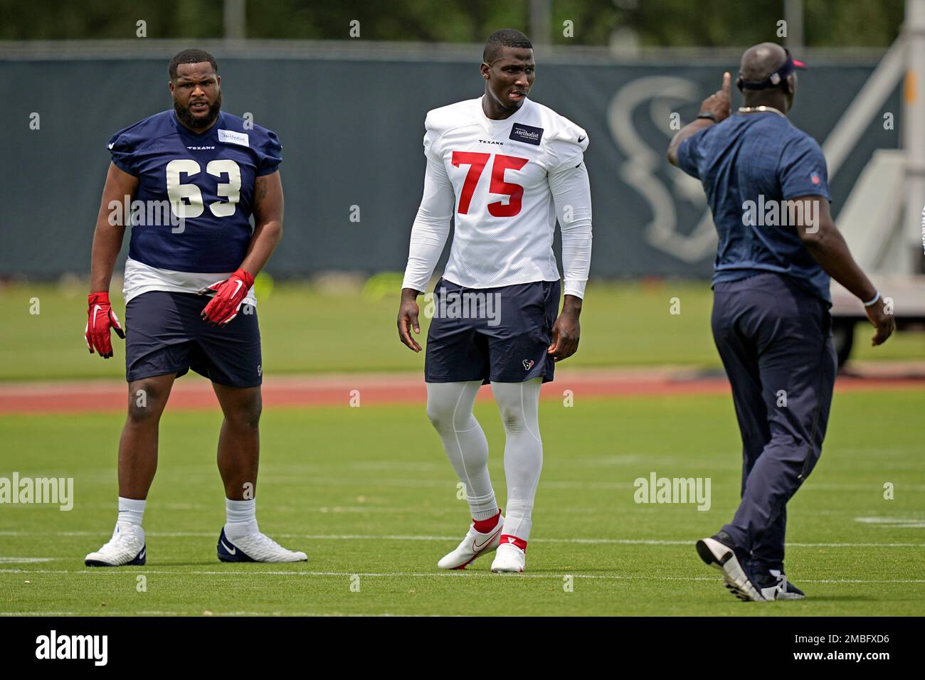 Houston Texans' Adedayo Odeleye (75) stretches during an NFL football rookie minicamp practice ...
