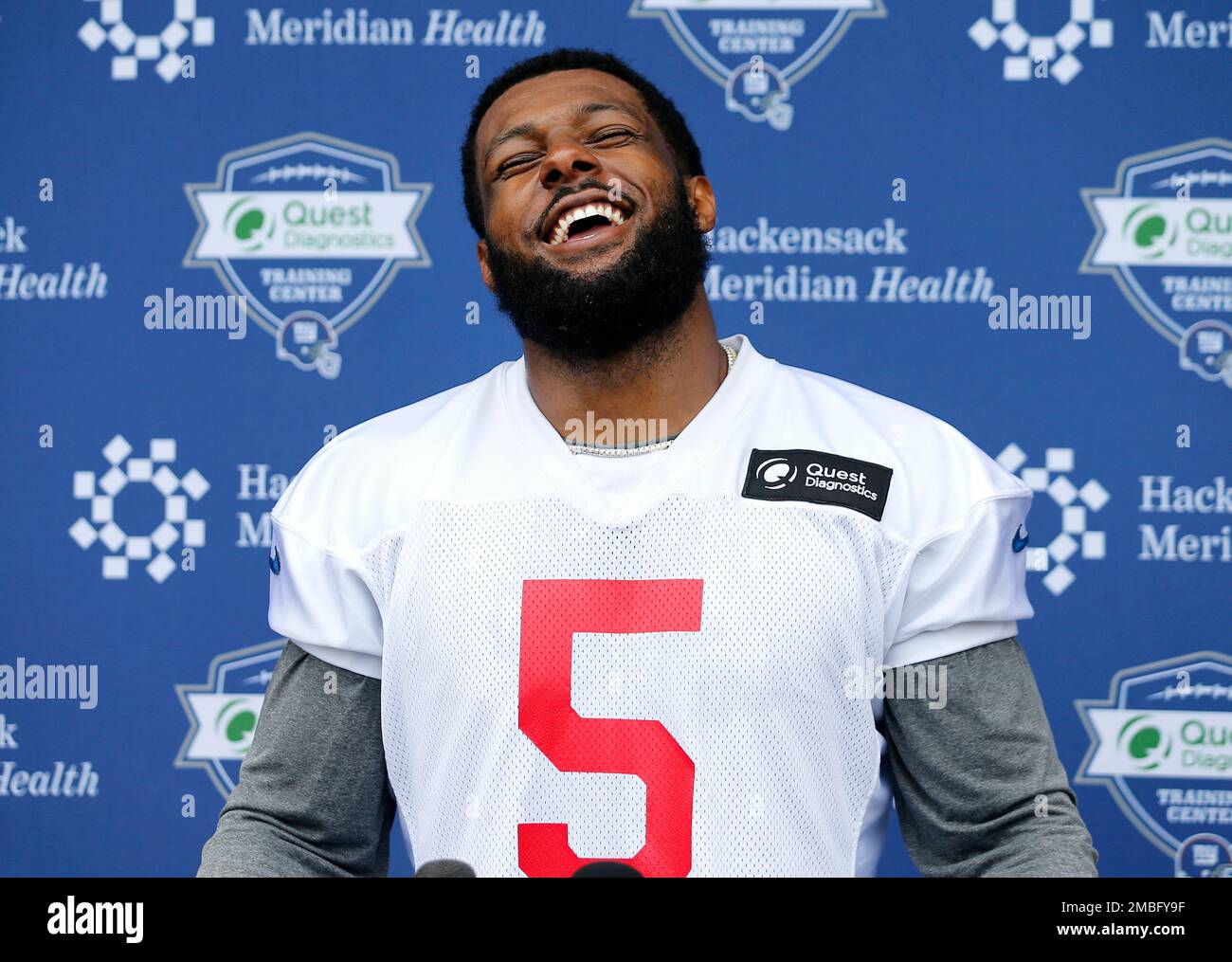 Kayvon Thibodeaux (5) reacts to questions from media at the NFL ...