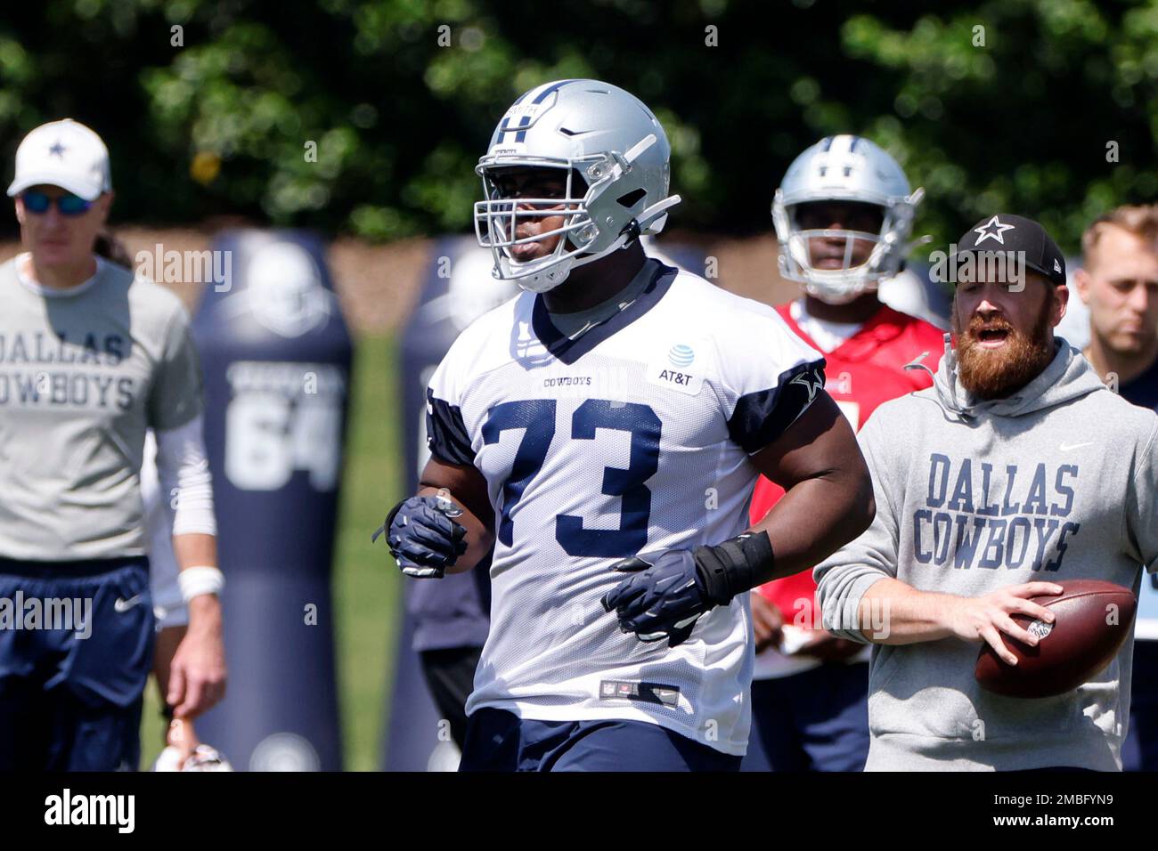 Dallas Cowboys offensive lineman Tyler Smith (73) jogs to the next ...