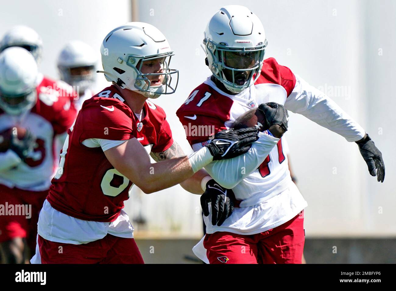 Arizona Cardinals' They McBride, left, and Myjai Sanders run drills at ...