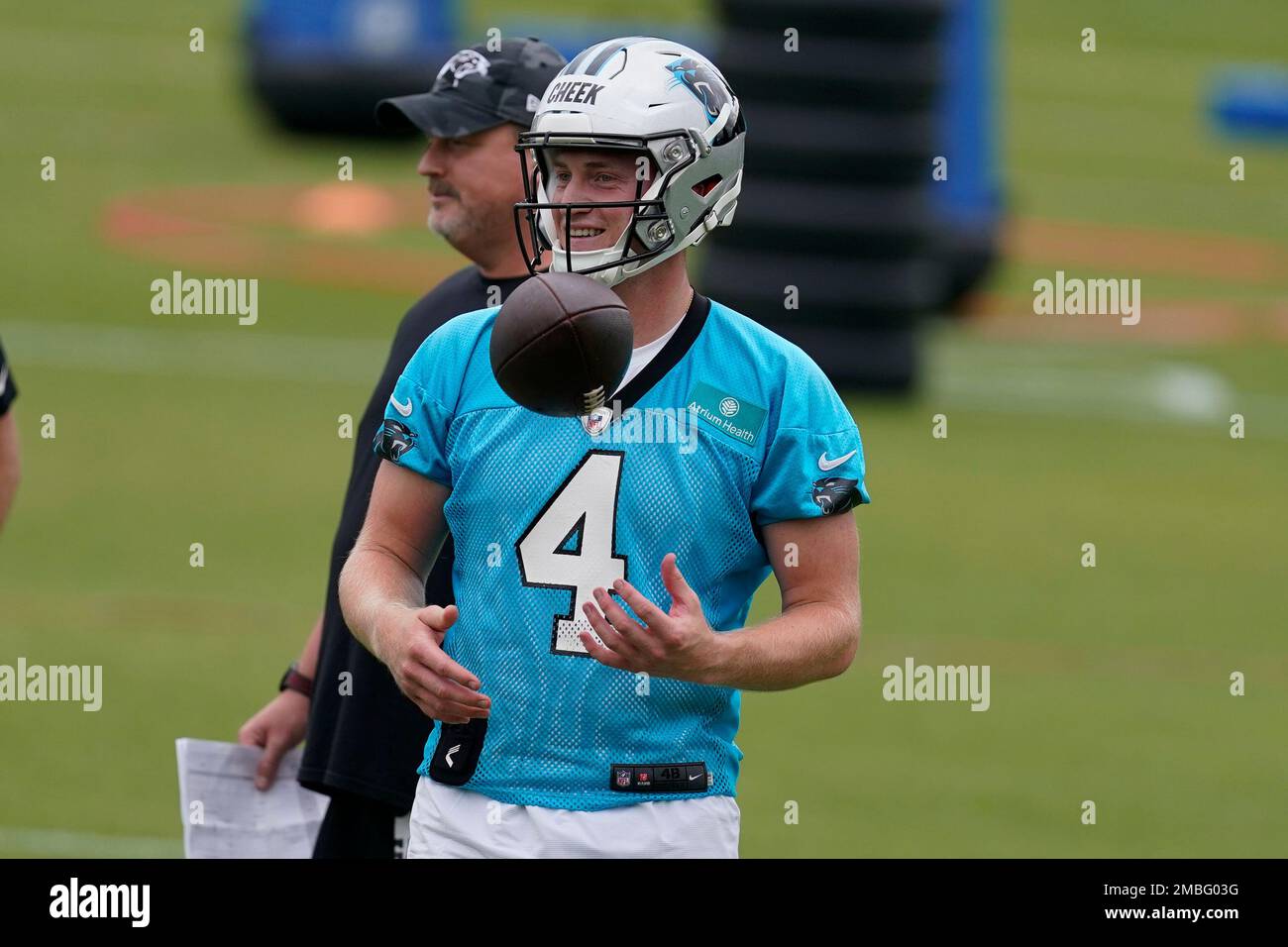 Carolina Panthers' Davis Cheek miles during drills at the NFL football ...