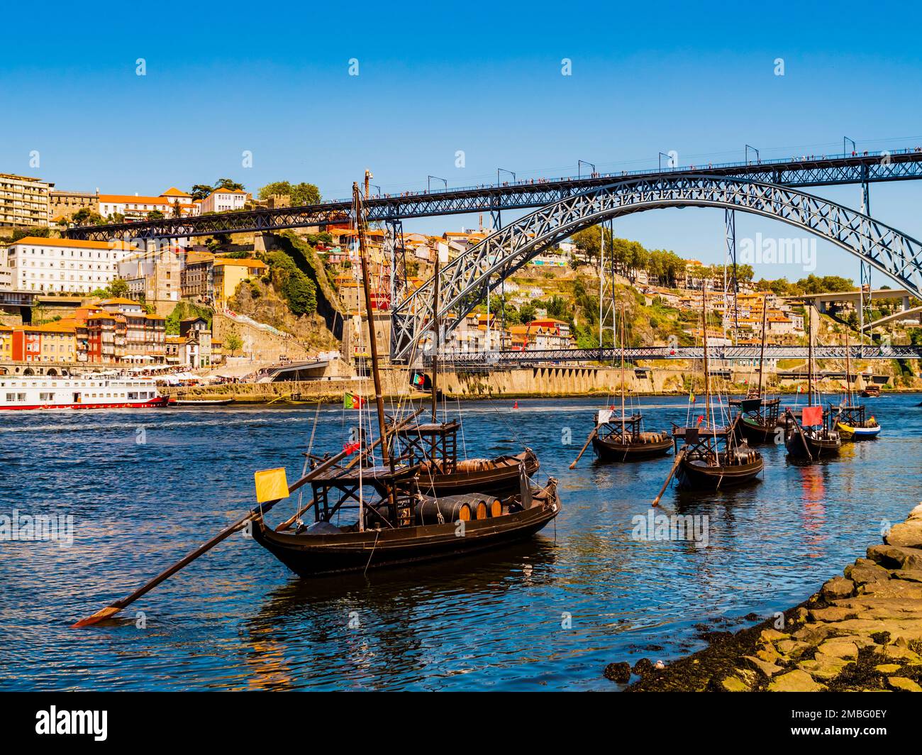 Amazing view of Porto, with its typical boats on the banks of Douro ...