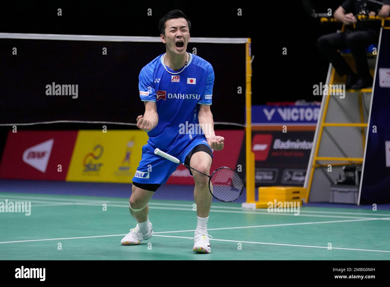 Japan's Kenta Nishimoto reacts after defeating Indonesia's Jonatan ...