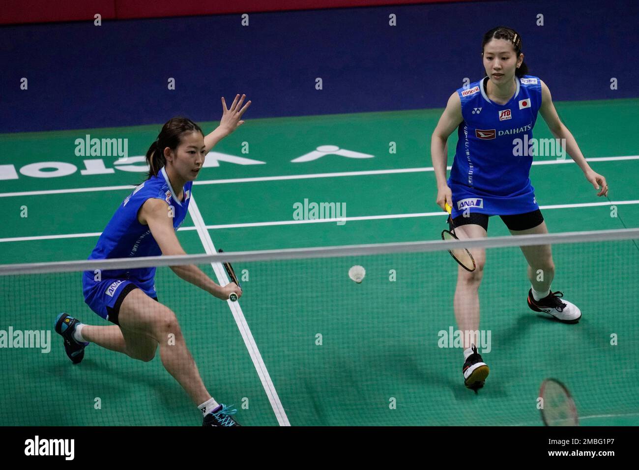 Japan's Nami Matsuyama, left, and Chiharu Shida, return a shot to South Korea's Shin Seung-chan ...