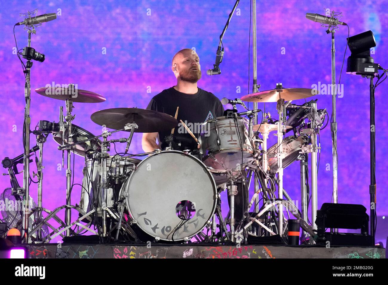 Will Champion of Coldplay performs during the band's Music of the ...