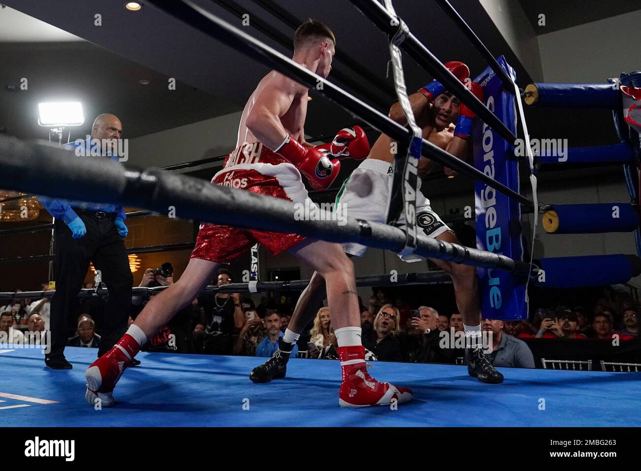 Callum Walsh, left, fights Luis Garcia during a super welterweight ...